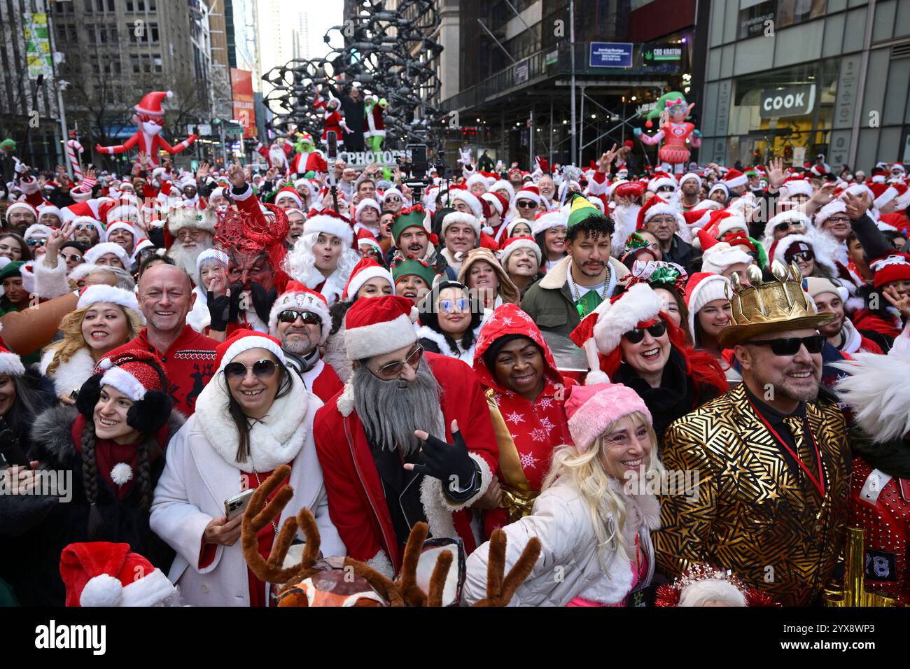 Photo by: NDZ/STAR MAX/IPx 2024 12/14/24 People dressed in Santa Claus ...