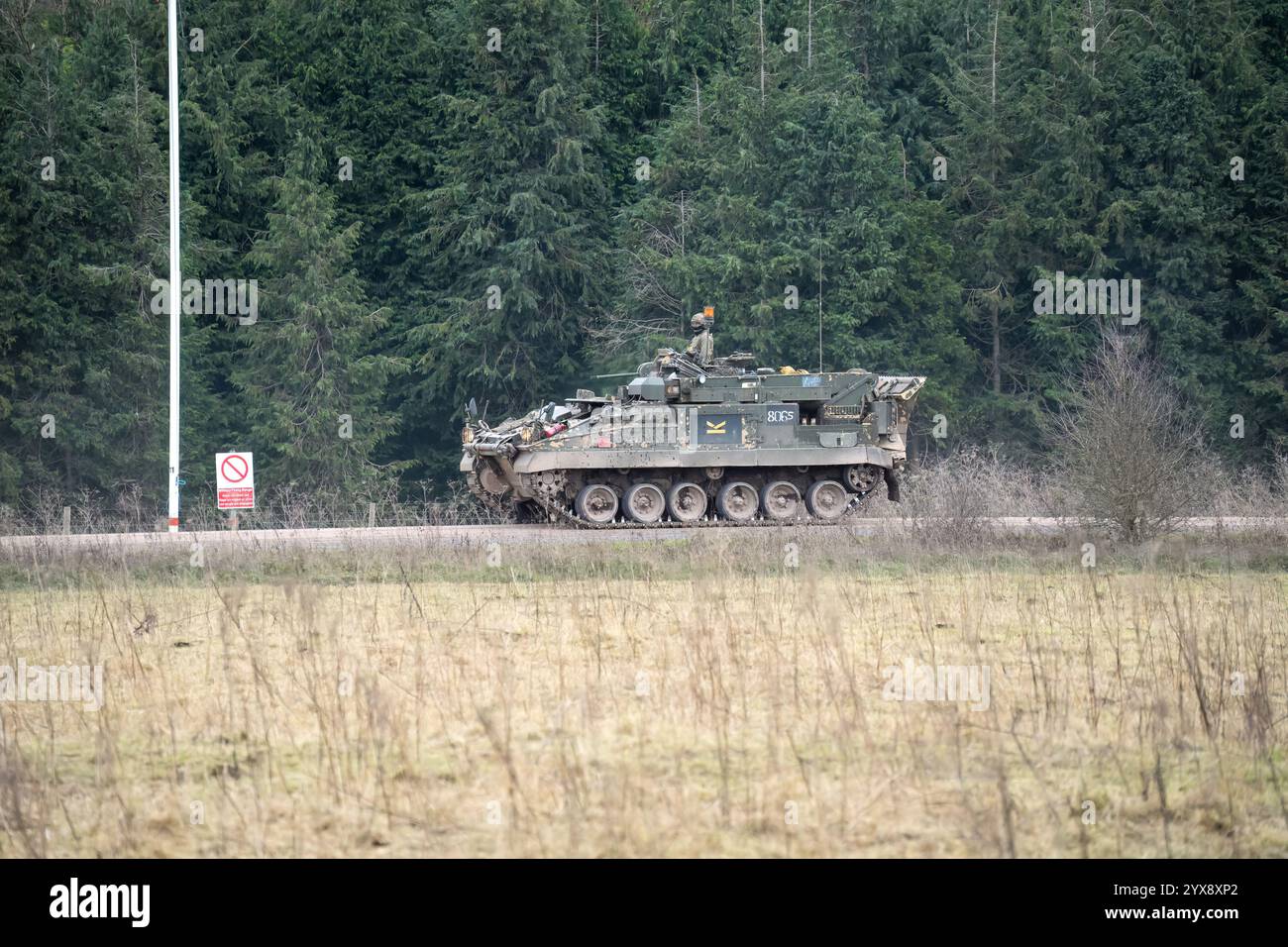a British army Warrior MRV FV512 MRV tank with crane and gun moving ...