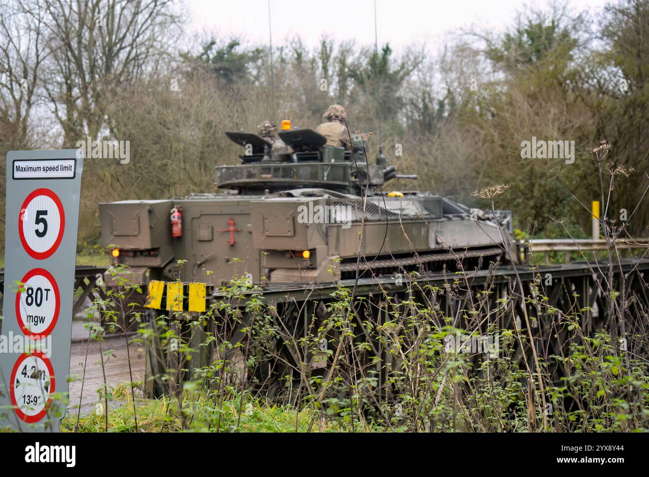 commander and gunner directing a British army Warrior FV510 IFV in ...