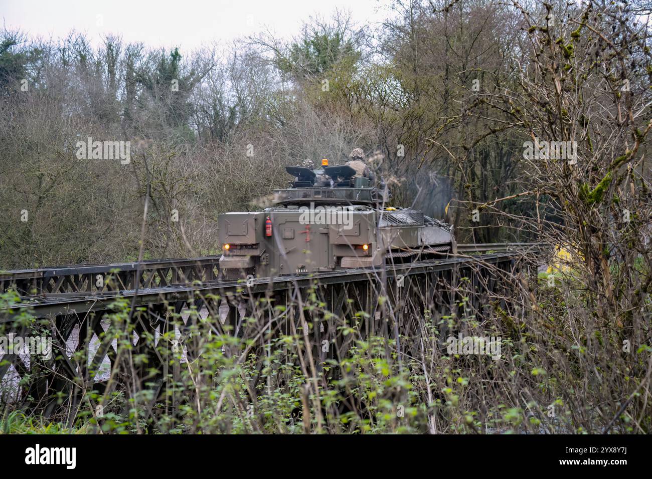 commander and gunner directing a British army Warrior FV510 IFV in ...