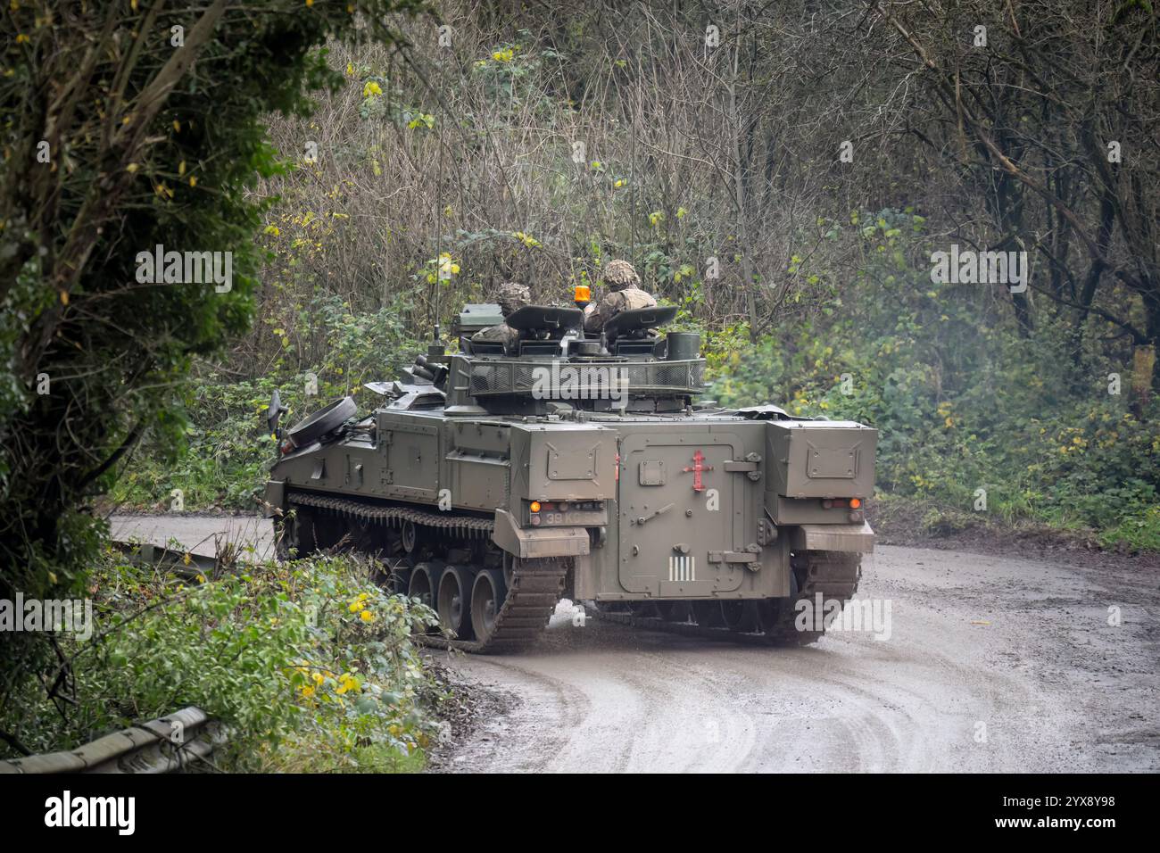 commander and gunner directing a British army Warrior FV510 IFV in ...