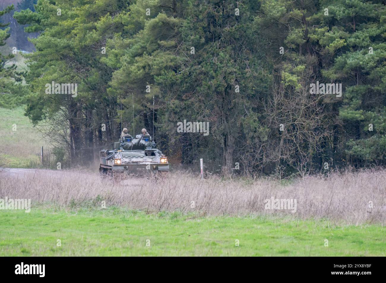 commander and gunner directing a British army Warrior FV510 IFV in ...