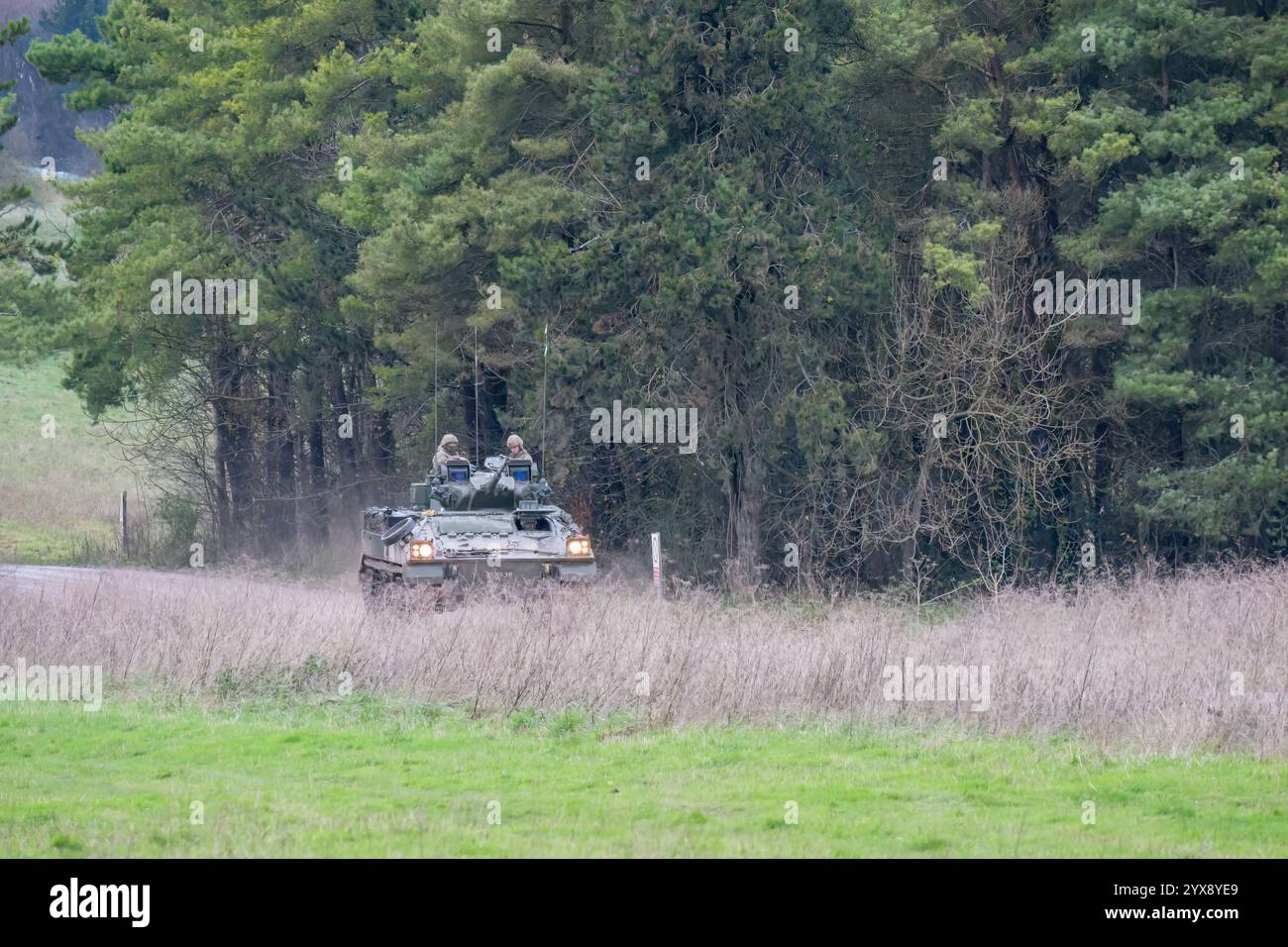commander and gunner directing a British army Warrior FV510 IFV in ...