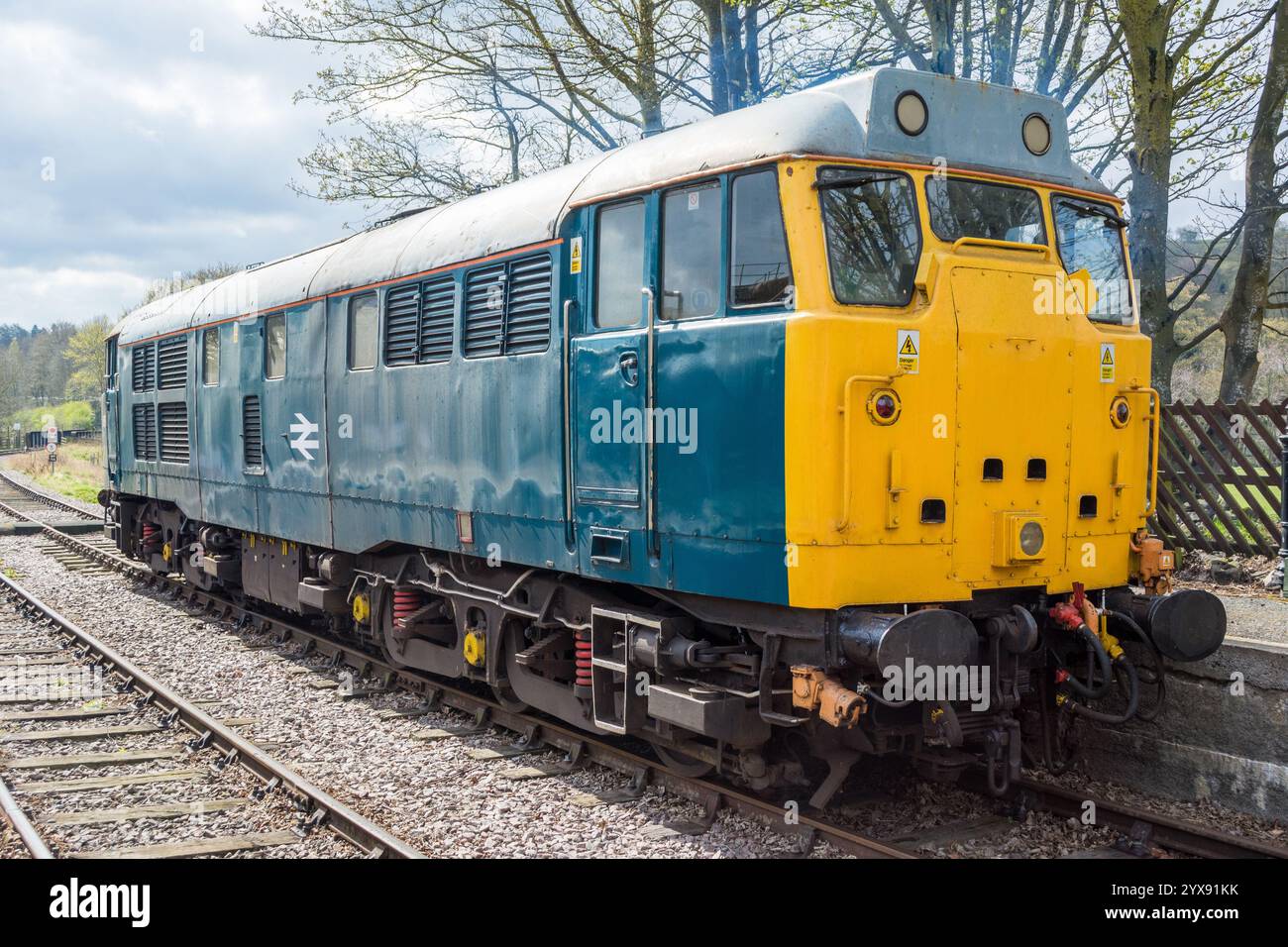 A preserved Class 31 diesel locomotive in BR blue livery standing at a ...