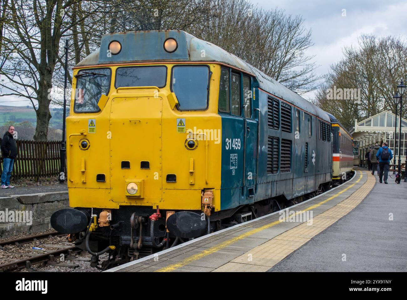 A preserved Class 31 diesel locomotive in BR blue livery standing at a ...