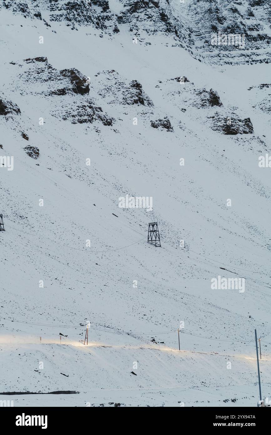 Wooden aerial cableway mining structure in snow in Longyearbyen ...