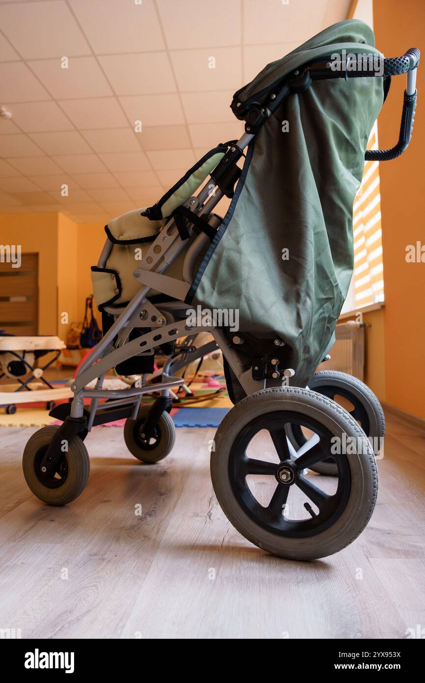 Modern Lightweight Stroller in a Bright Indoor Playroom Stock Photo - Alamy