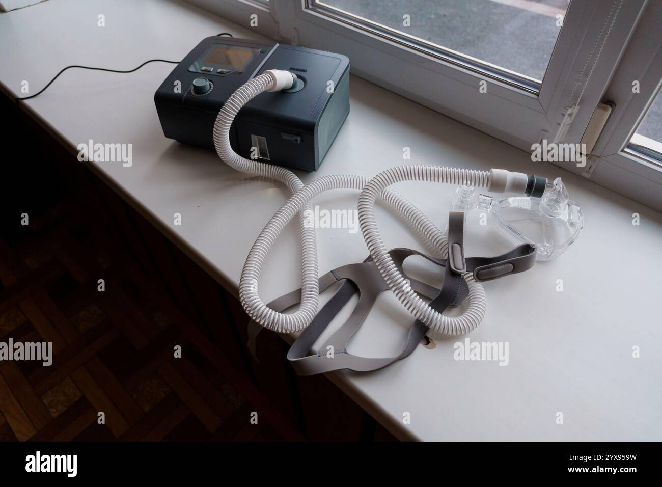 Home CPAP Machine on a Window Ledge Ready for Use Stock Photo - Alamy
