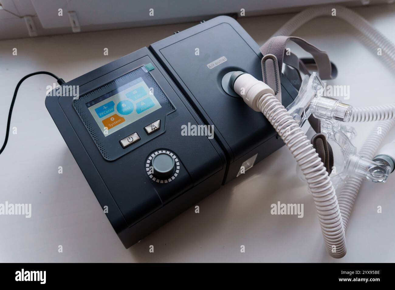 A Modern CPAP Machine with Digital Display and Tubing Stock Photo - Alamy