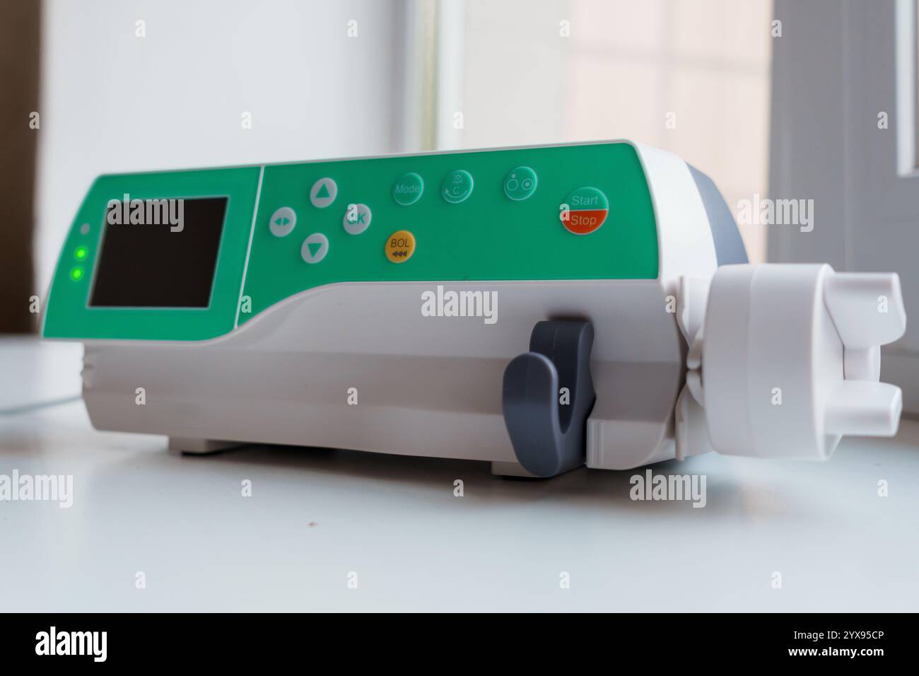 Modern Medical Infusion Pump on a Clean Surface Stock Photo - Alamy