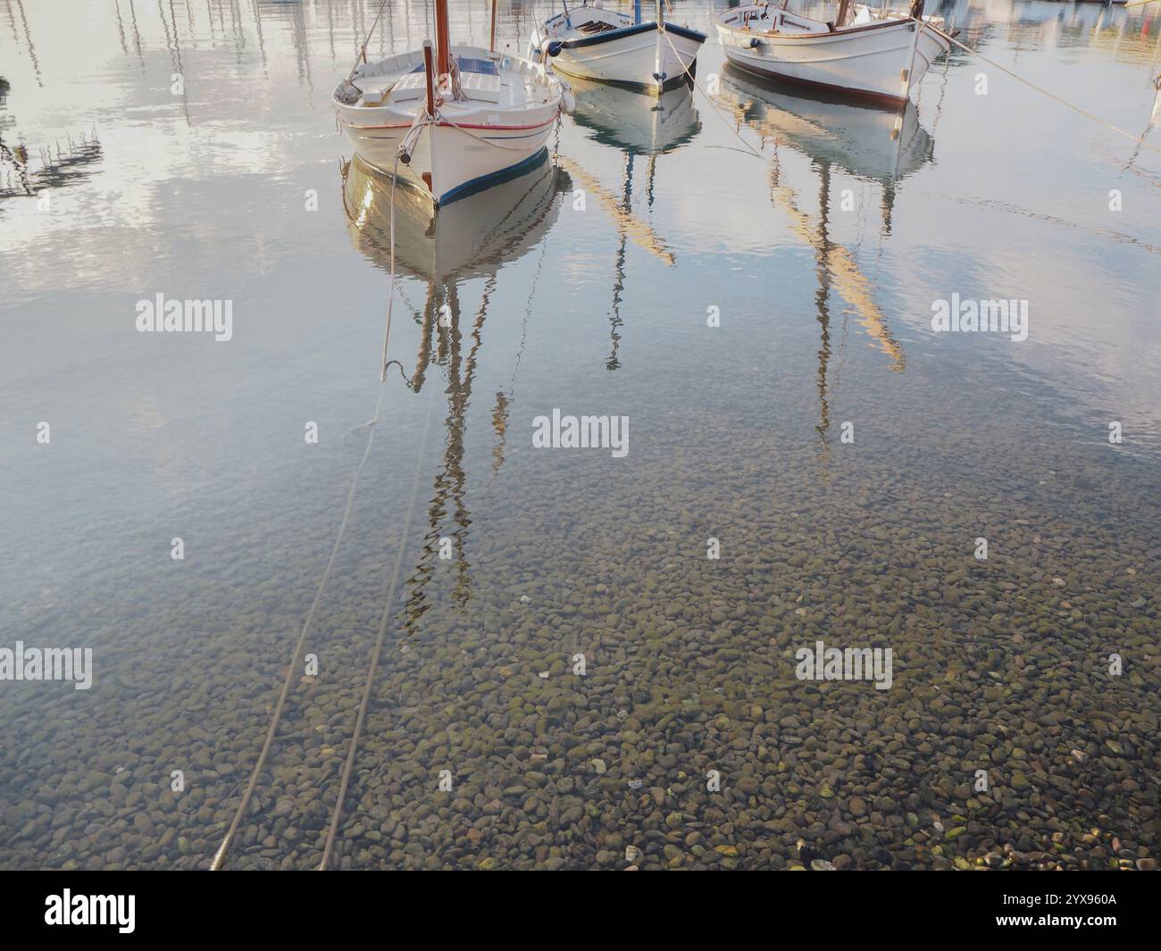 Three boats with transparency in the water Stock Photo - Alamy