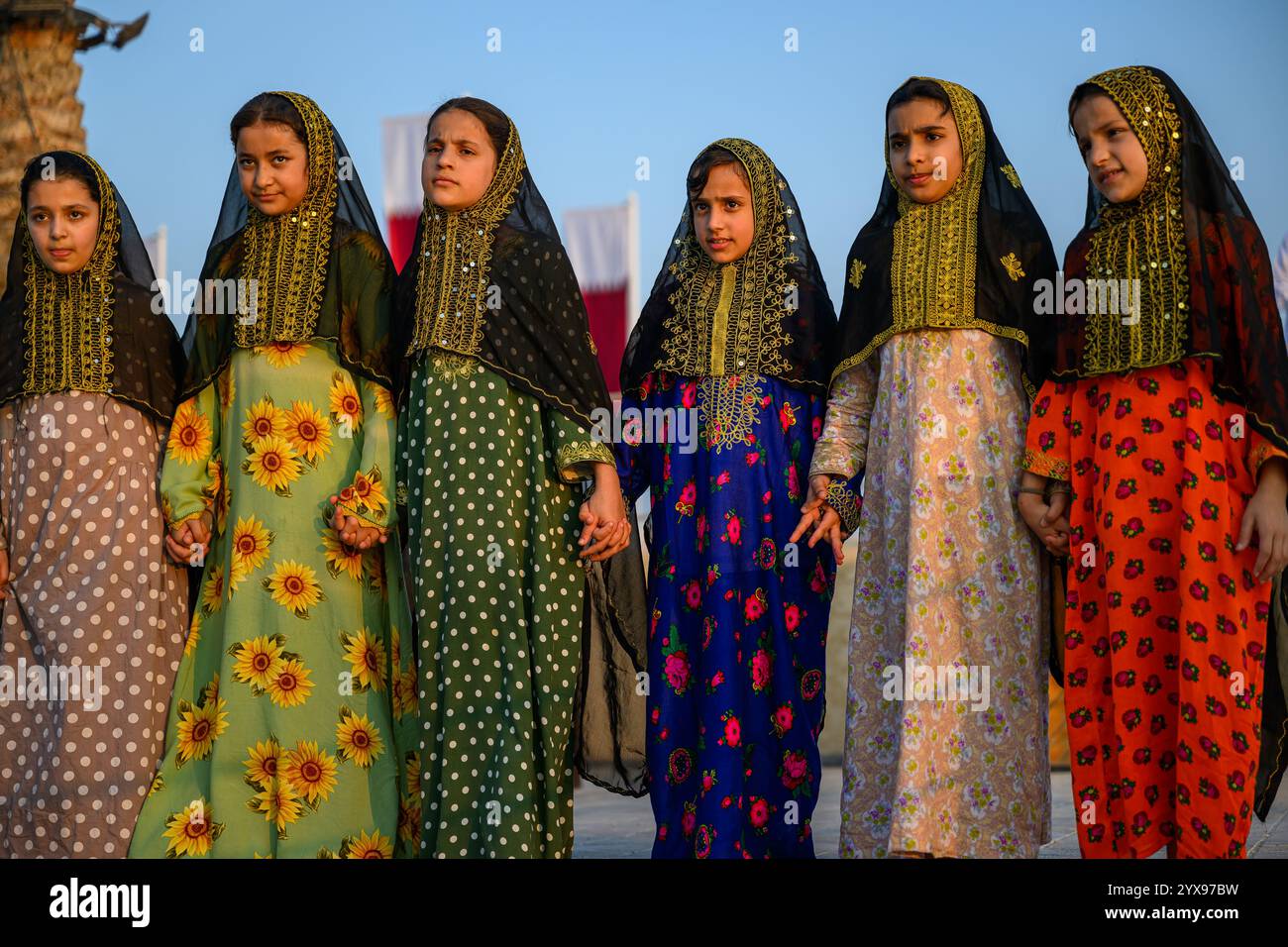 Doha, Qatar, December 13, 2024: Children occasionally wear traditional ...