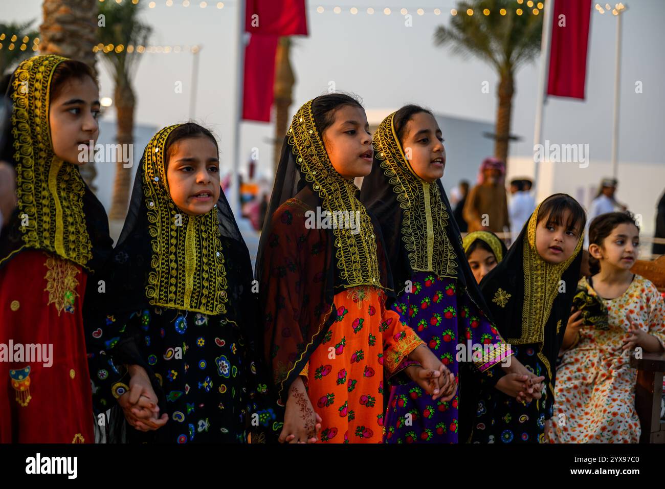 Doha, Qatar, December 13, 2024: Children occasionally wear traditional ...