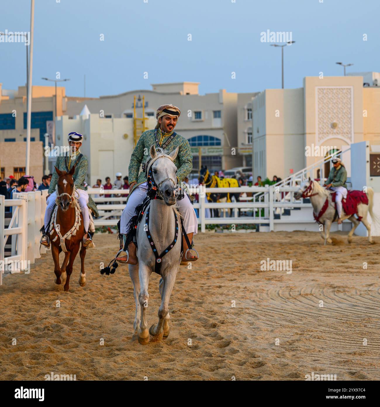 DOHA, QATAR - December 13, 2024: Men riding horses to celebrate Qatar ...