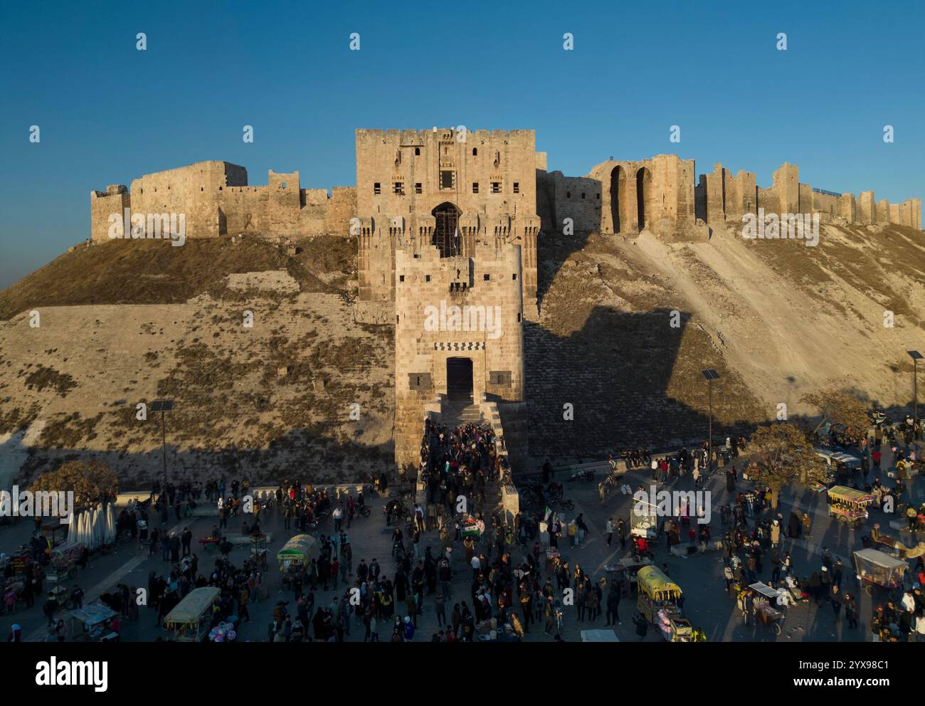 An arial shot shows residents visit the ancient Aleppo Citadel in the ...