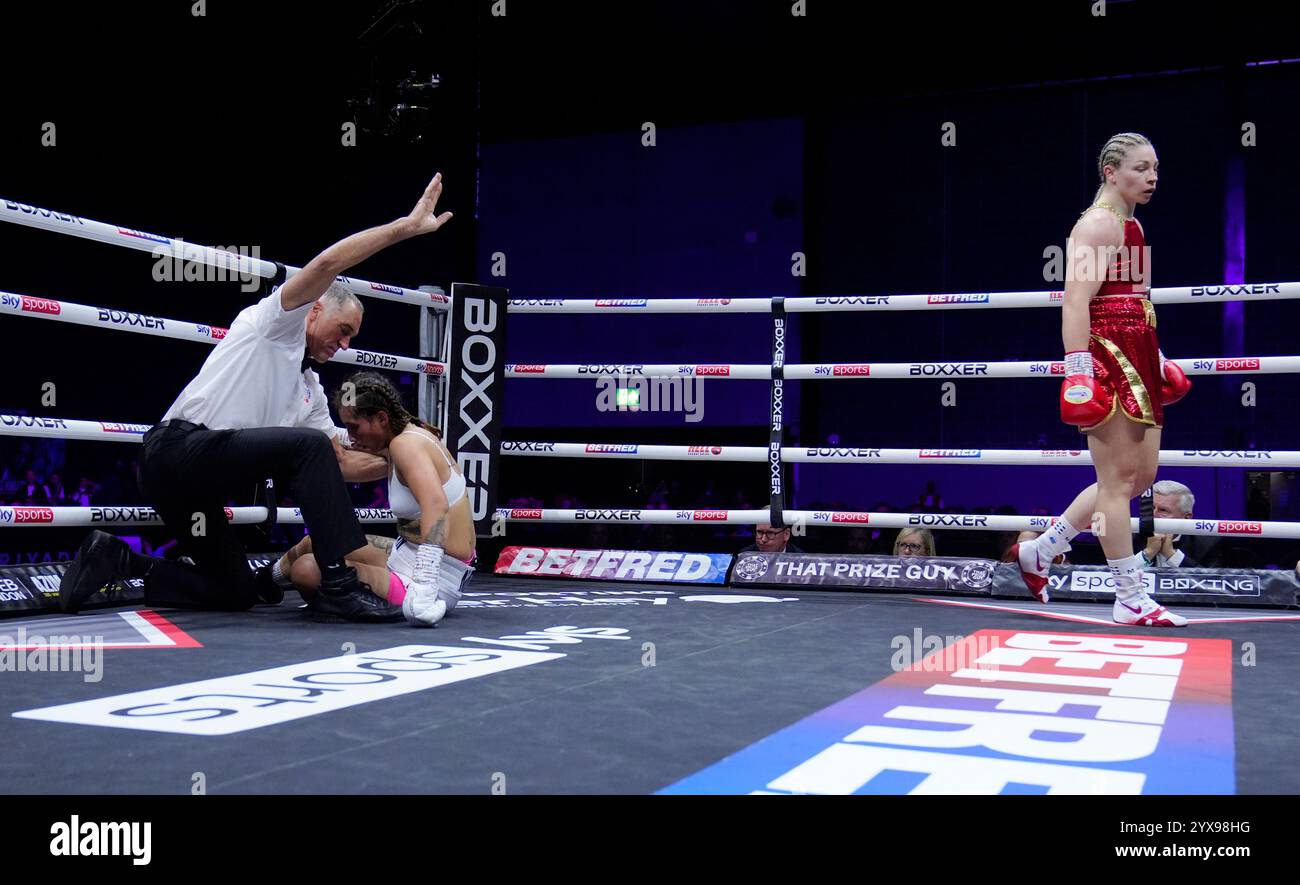 Bexcy Mateus (left) after losing the WBA, IBO and Ring magazine World Welterweight Championship ...