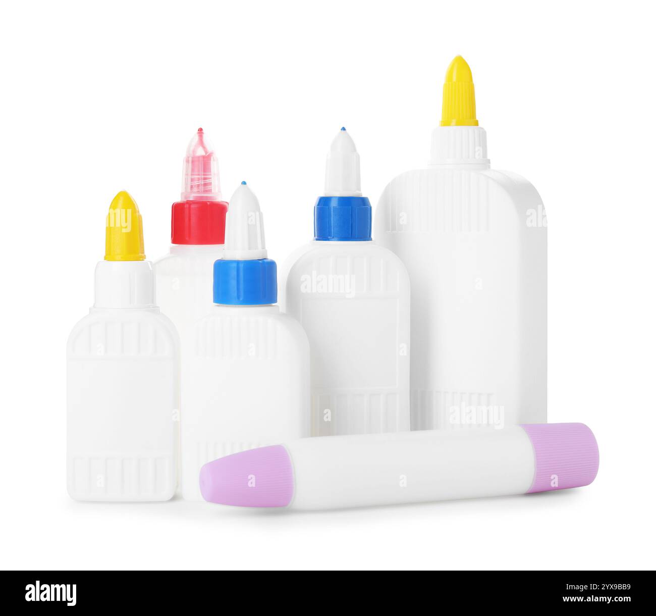 Bottles and sticks of glue on white background Stock Photo - Alamy