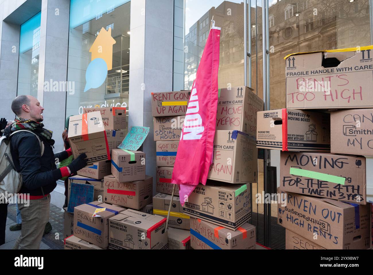 London, UK. 14 December, 2024. Housing activists place removal boxes ...