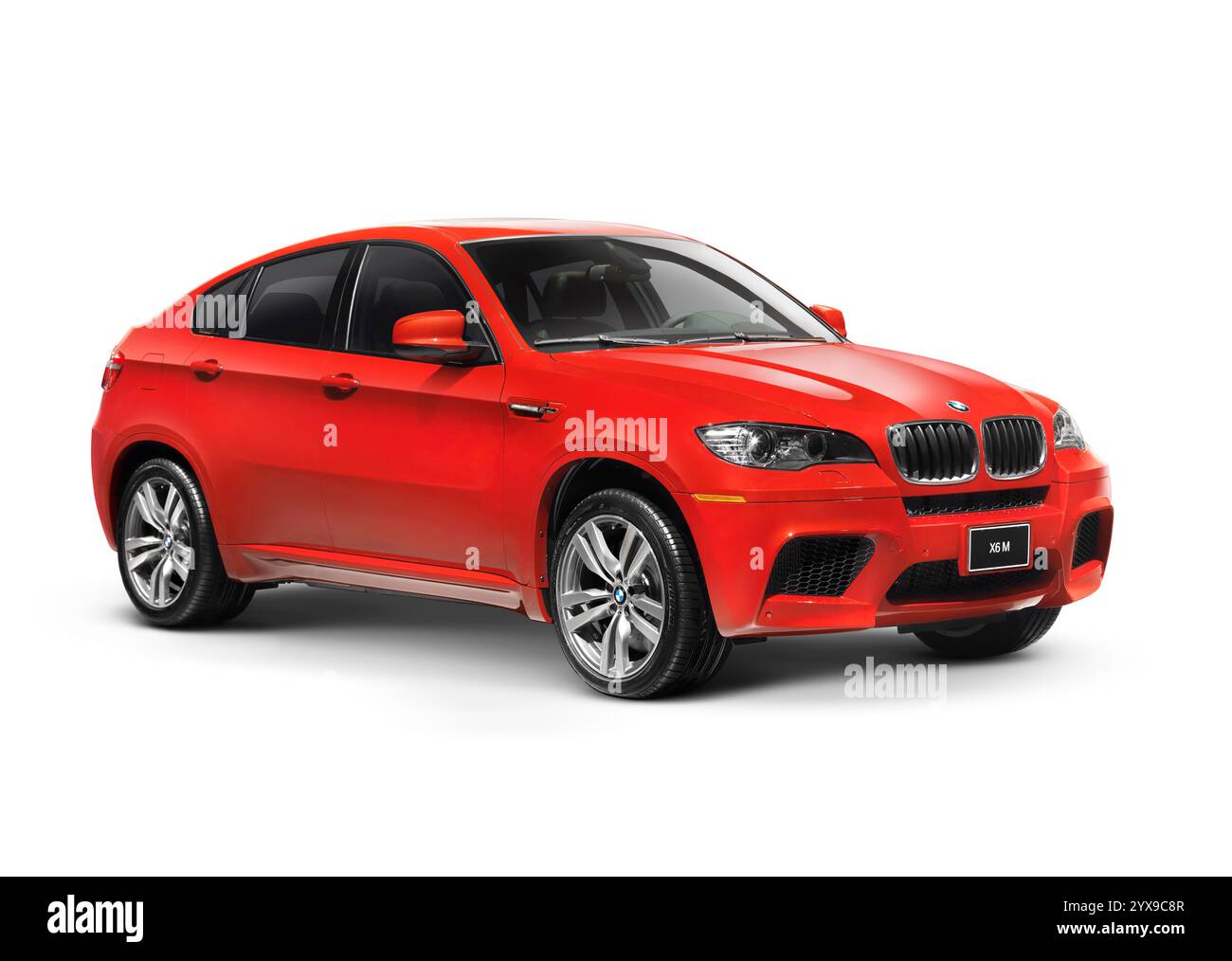 Red 2011 BMW X6 M crossover. Isolated car on white background with ...