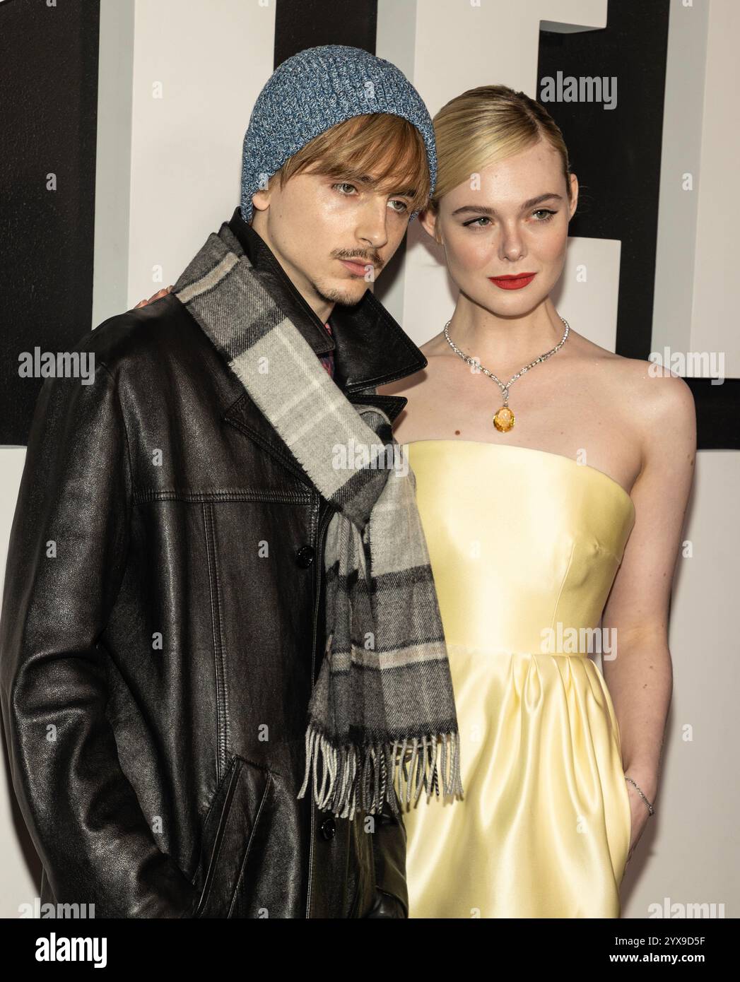 Timothee Chalamet and Elle Fanning wearing dress by Prada and Cartier ...