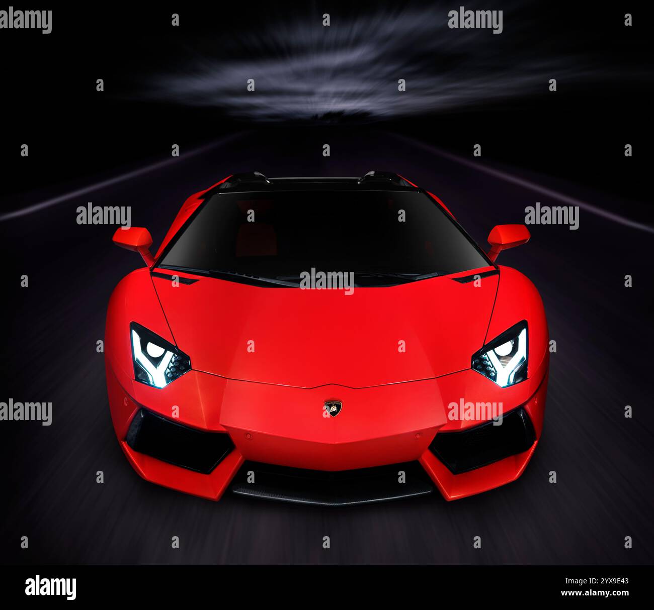 Red 2014 Lamborghini Aventador LP 700-4 Roadster supercar on the road ...