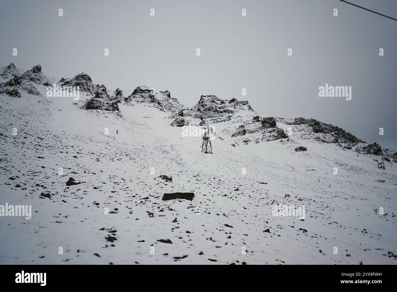 Old mining tramway on snowy mountainside in Longyearbyen, Svalbard ...