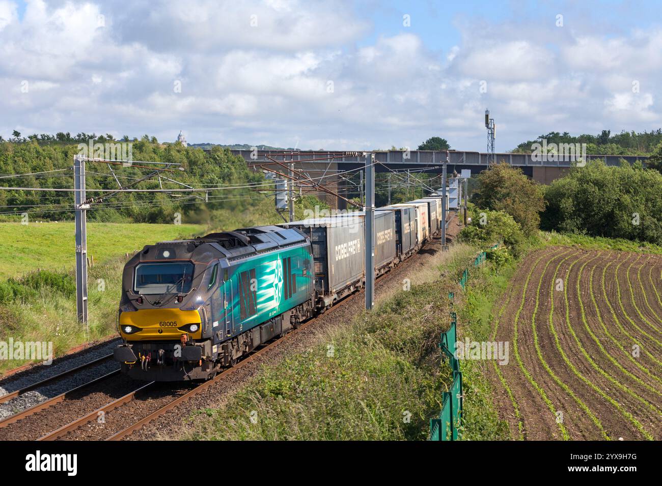 Direct Rail Services class 68 diesel locomotive 68005 hauling a inter-modal container freight ...