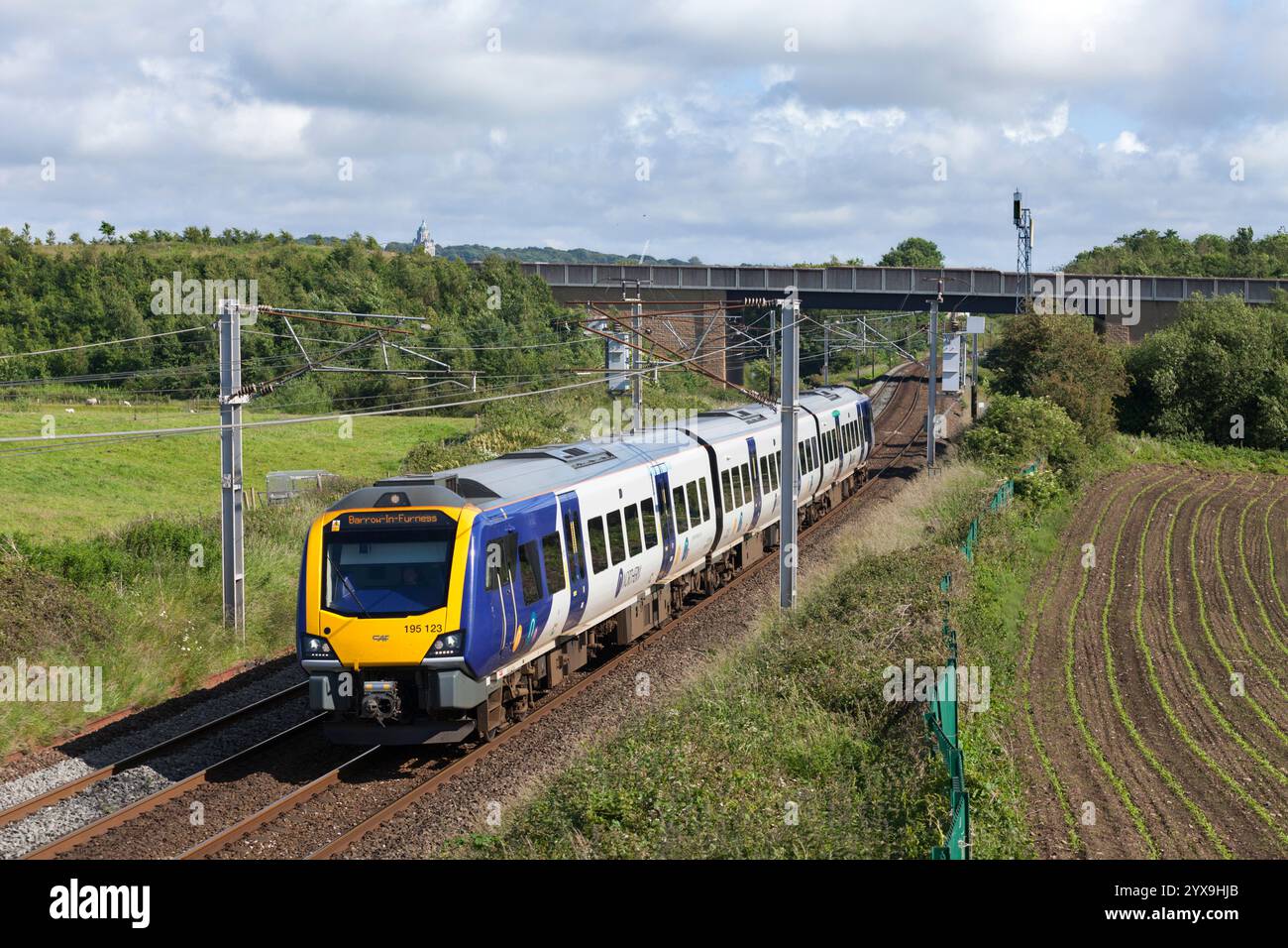 Northern Rail class 195 on the west coast mainline with a Manchester ...