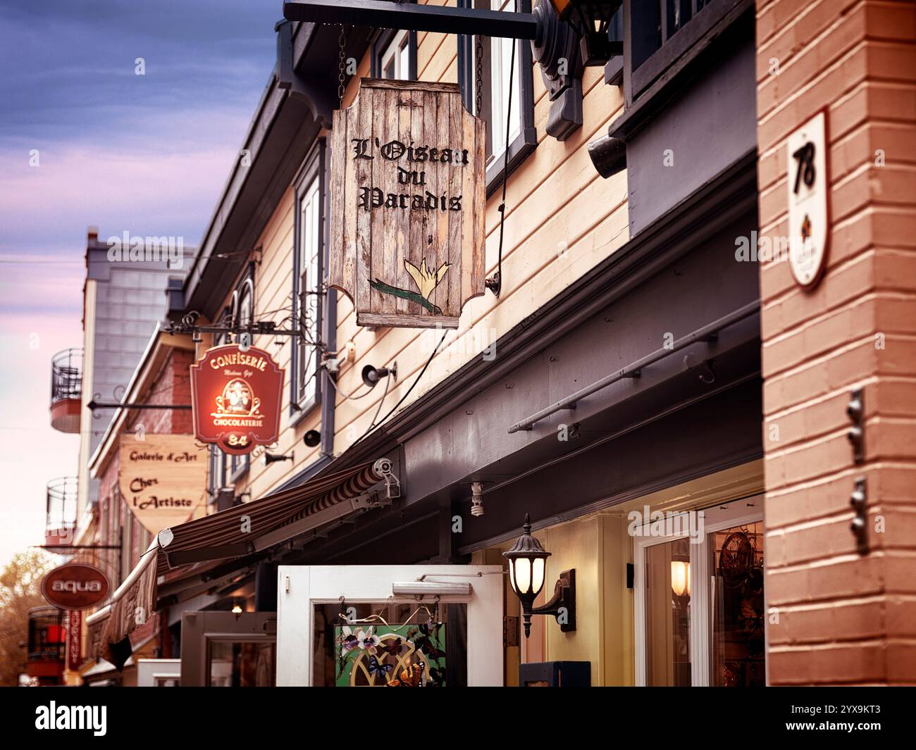 Vintage store signs at the historic street Petit Champlain in old ...