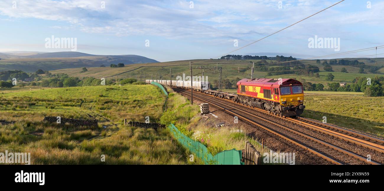 DB cargo Class 66 locomotive 66120 on the west coast main line in ...