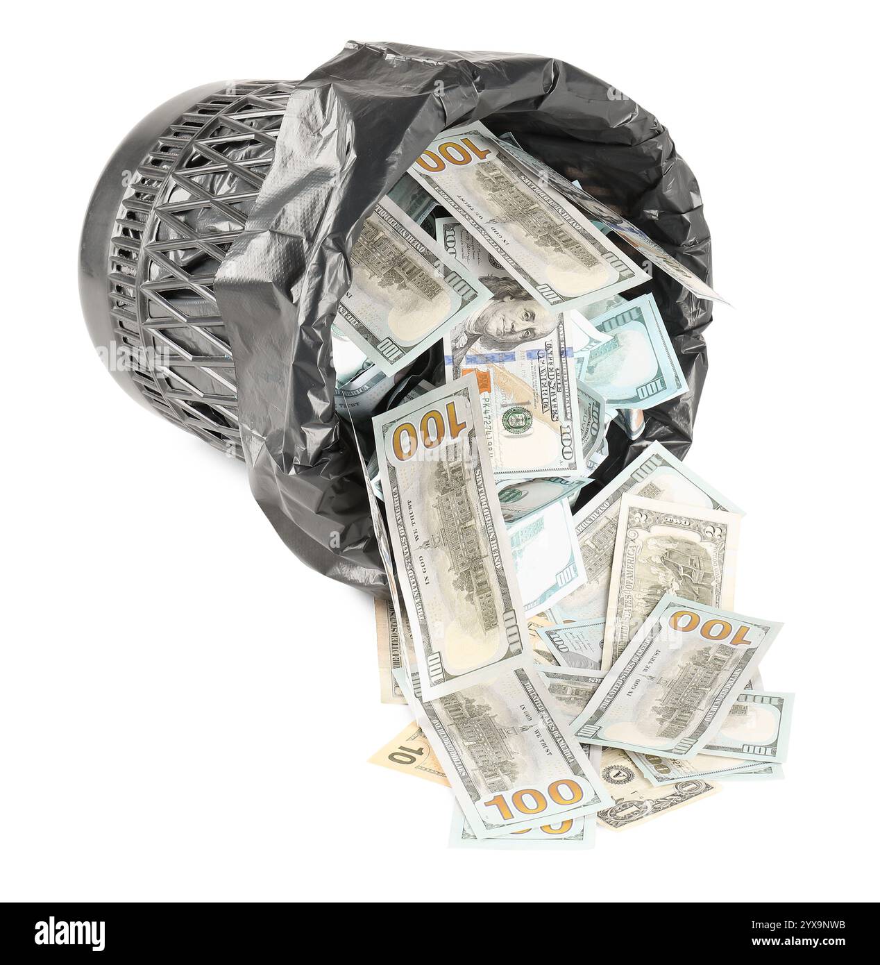 Many dollar banknotes and overturned trash bin isolated on white Stock ...