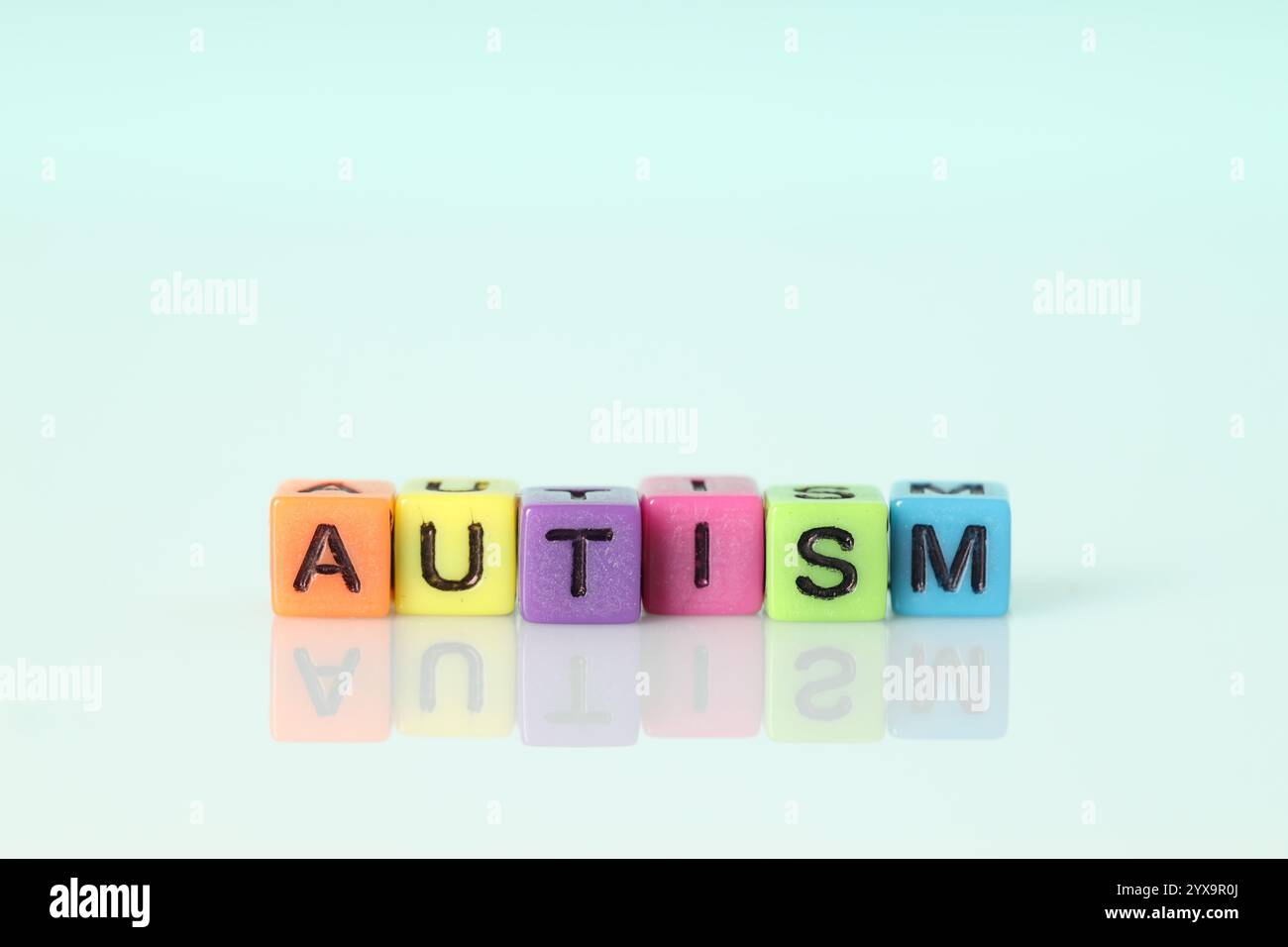 Word Autism made of colorful cubes on light background Stock Photo - Alamy