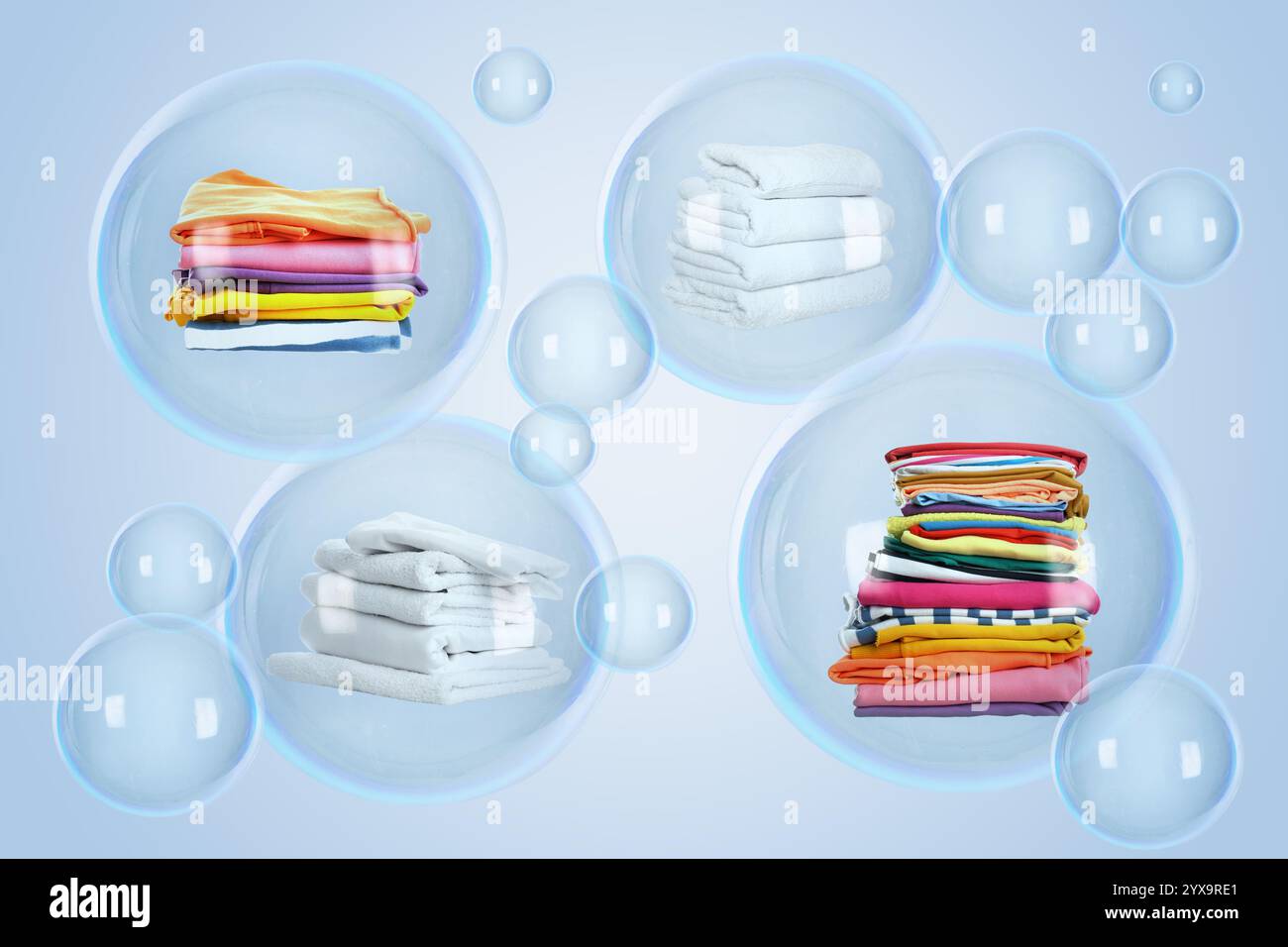 Several soap bubbles with stacked laundry inside and empty ones ...