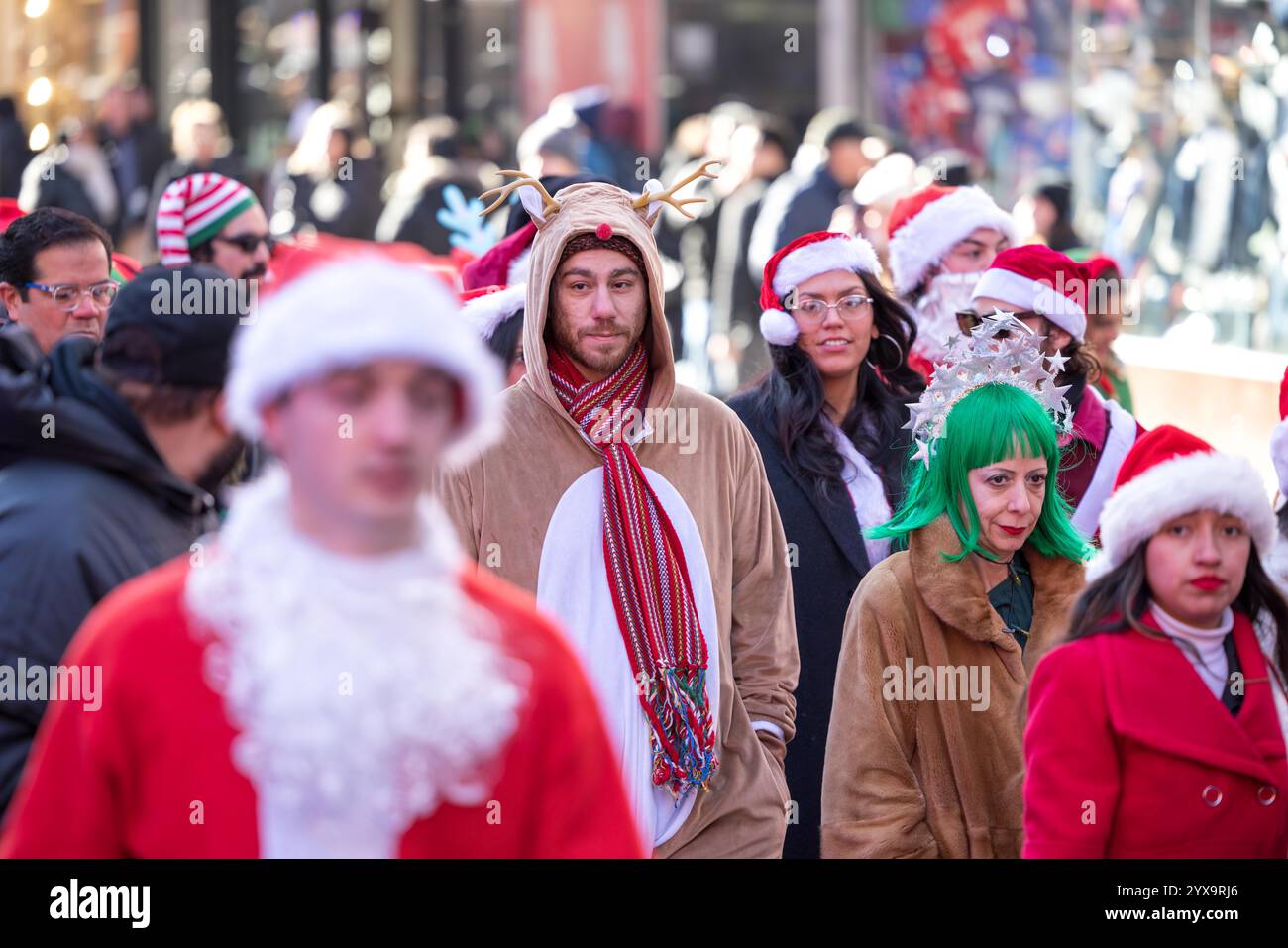 New York, United States . 14th Dec, 2024. People in Santa Claus ...