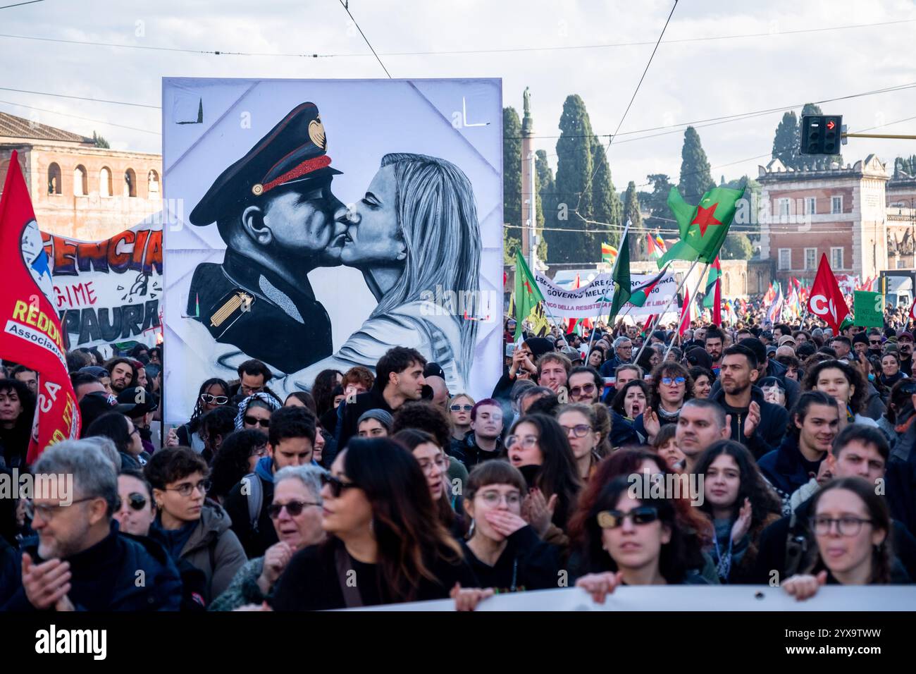 Rome, Italy. 14th Dec, 2024. A billboard shows a kiss between Meloni ...