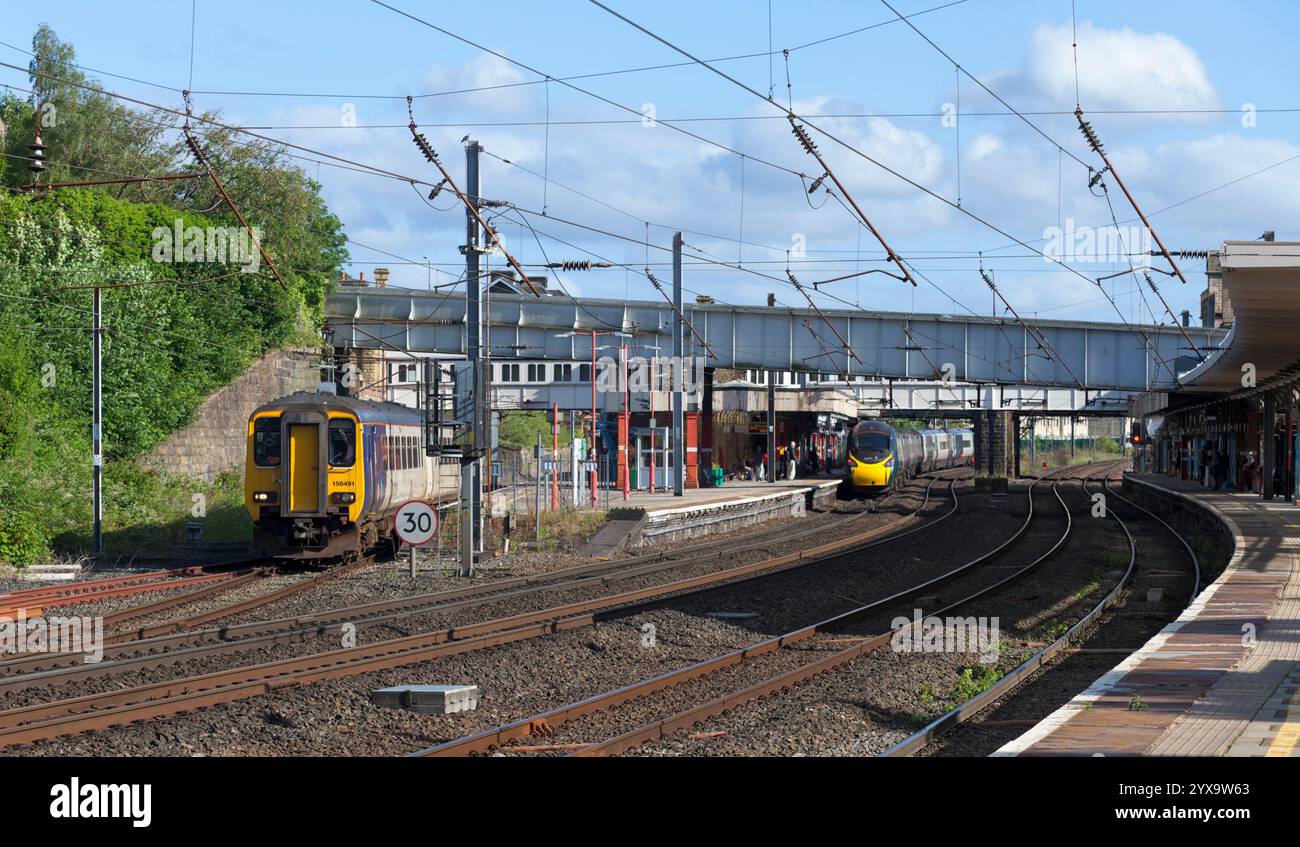 Northern Rail class 156 sprinter train and Avanti West Coast Pendolino ...