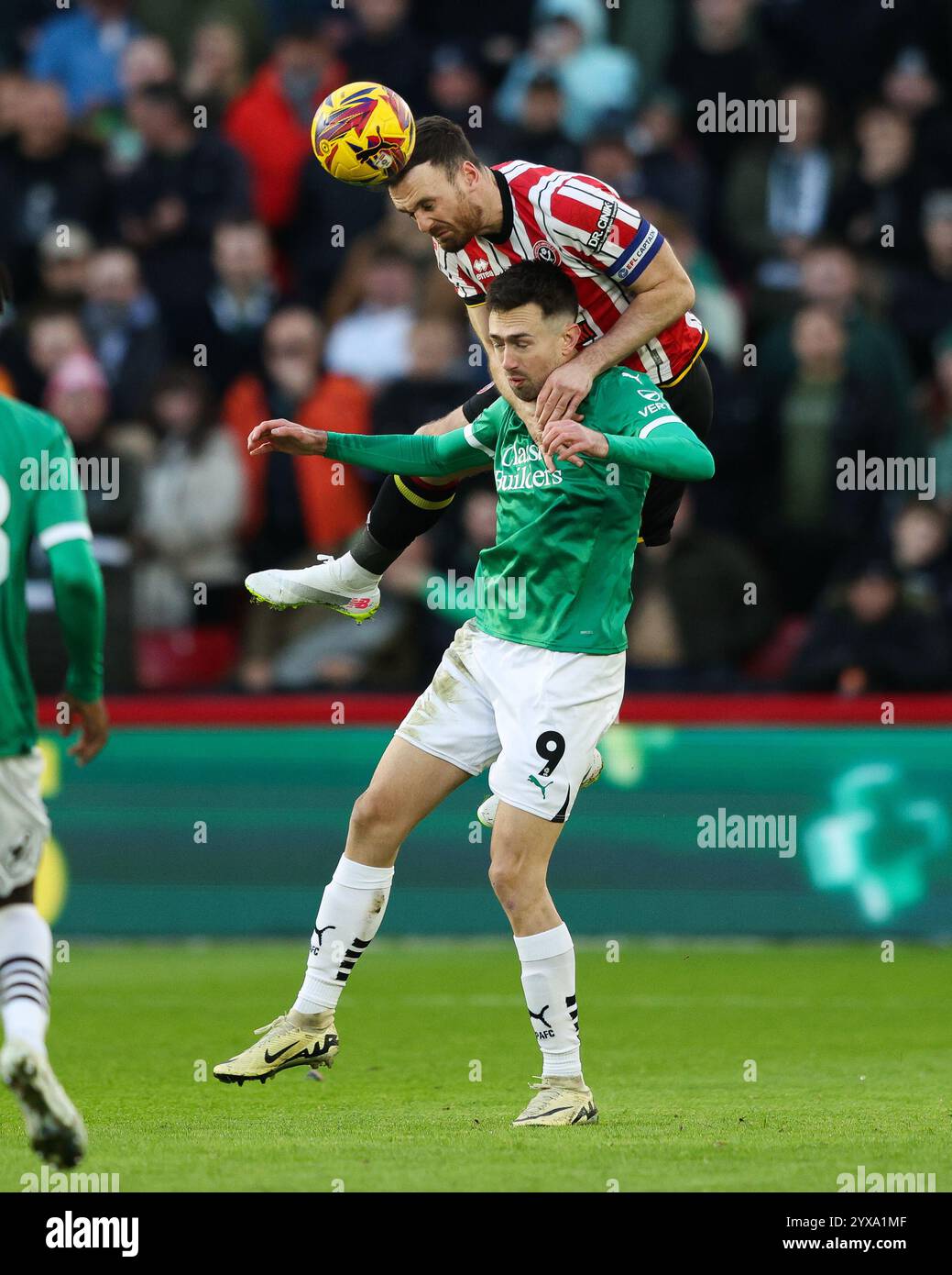 Sheffield, UK. 14th Dec, 2024. Jack Robinson of Sheffield United jumps ...