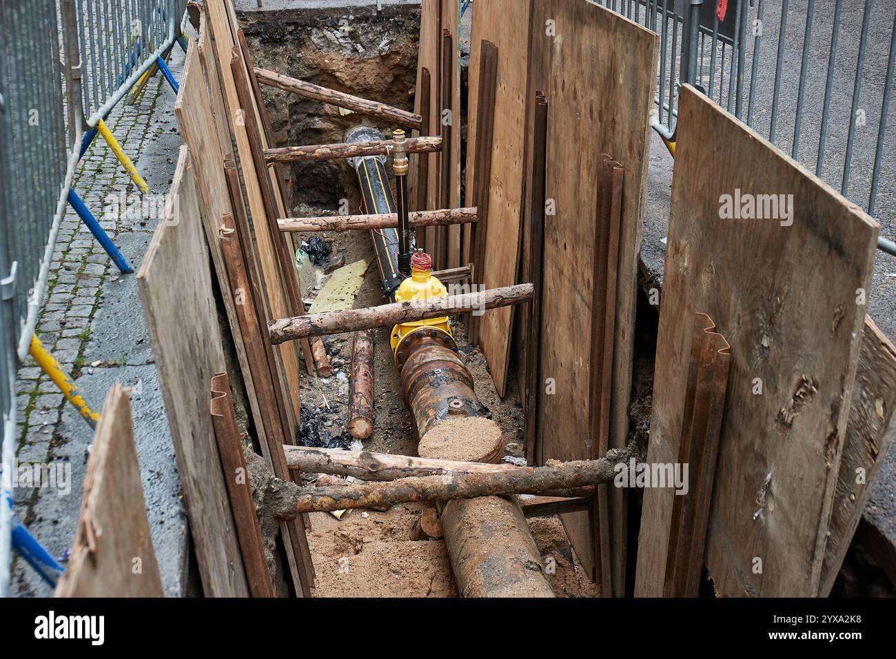 Construction site utility pipes hole Stock Photo - Alamy