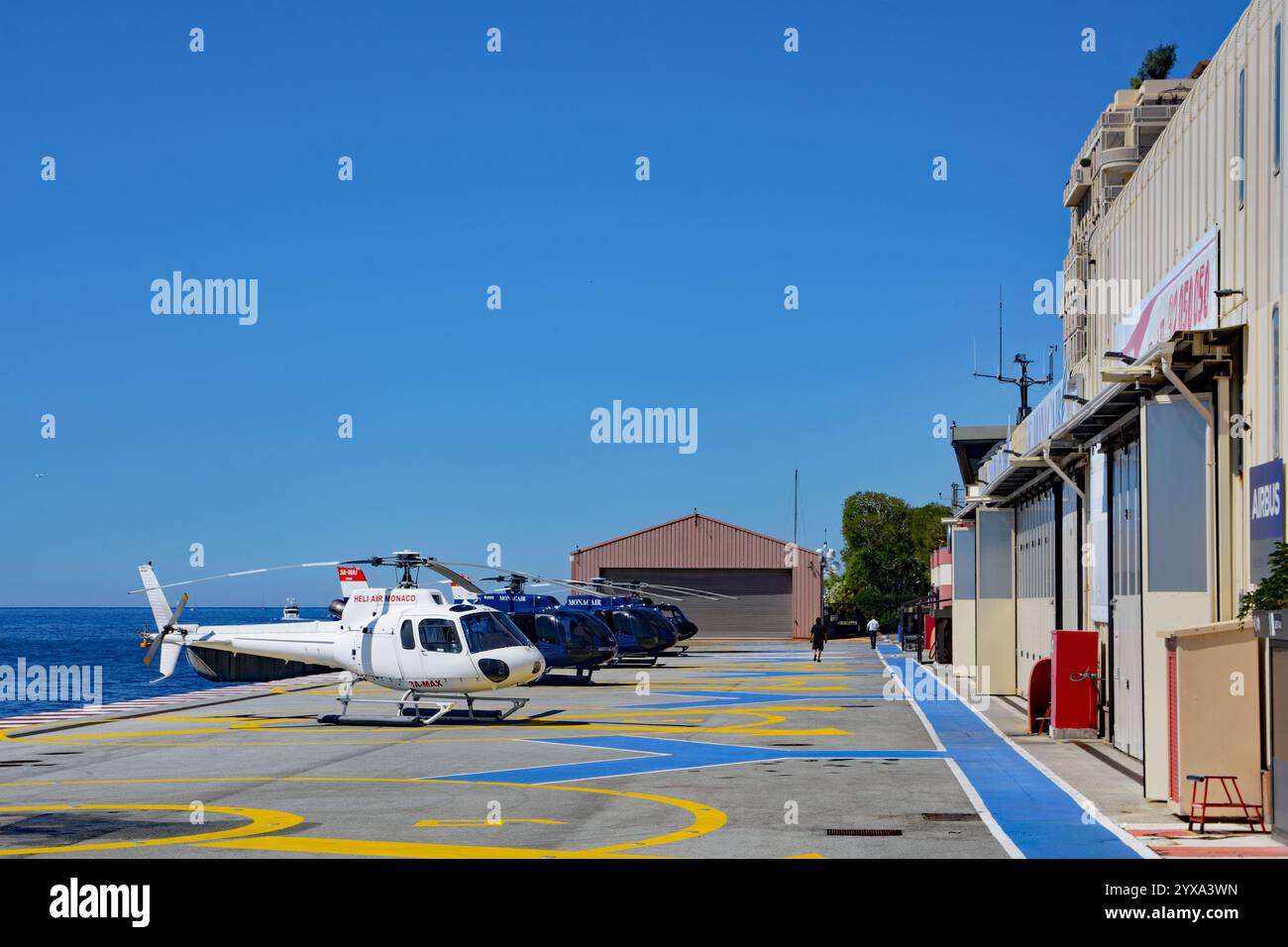 Overview of the Monaco heliport with buildings, helicopters of Heli Air ...