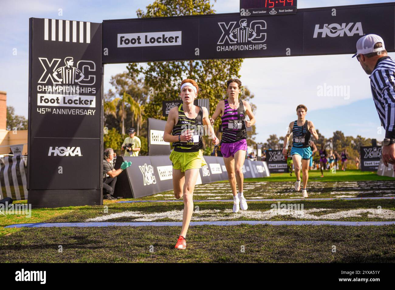 Matthew Giardina celebrates after finishing 7th in the boys race in 15: ...