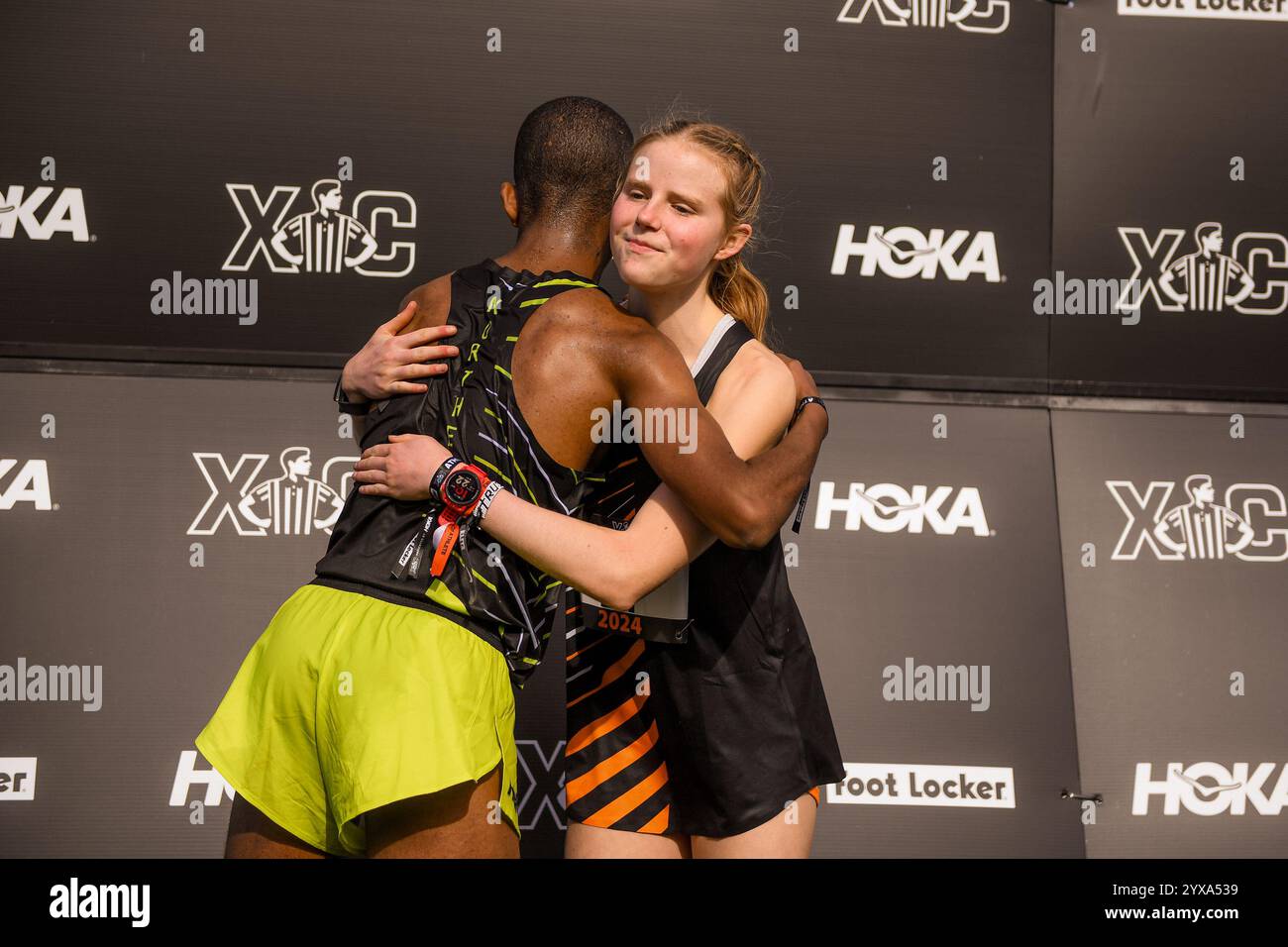 Tamrat Gavenas (left) and Elizabeth Leachman (right) congratulate each other after in the boys ...