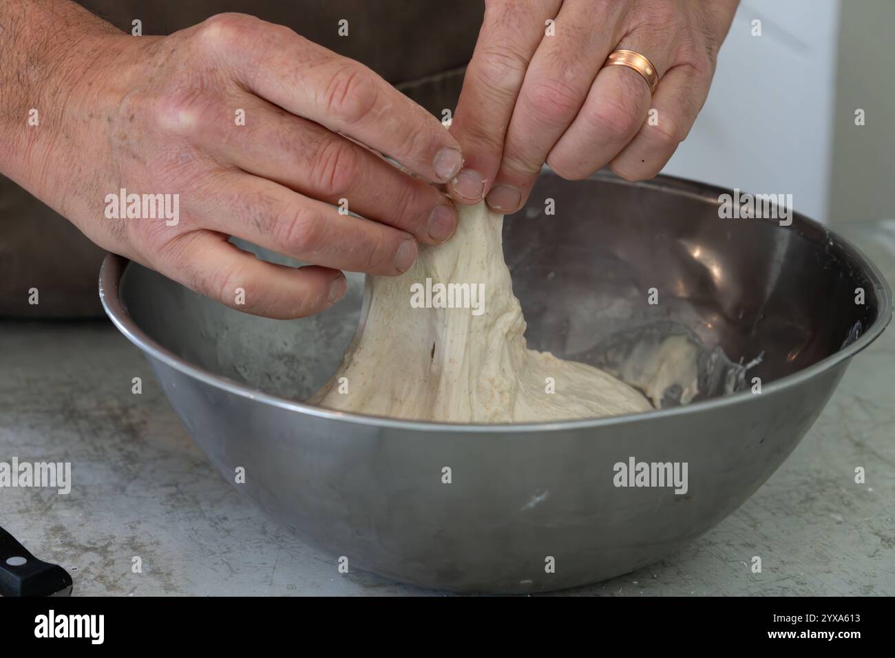 Sourdough bread mixing and baking Stock Photo - Alamy
