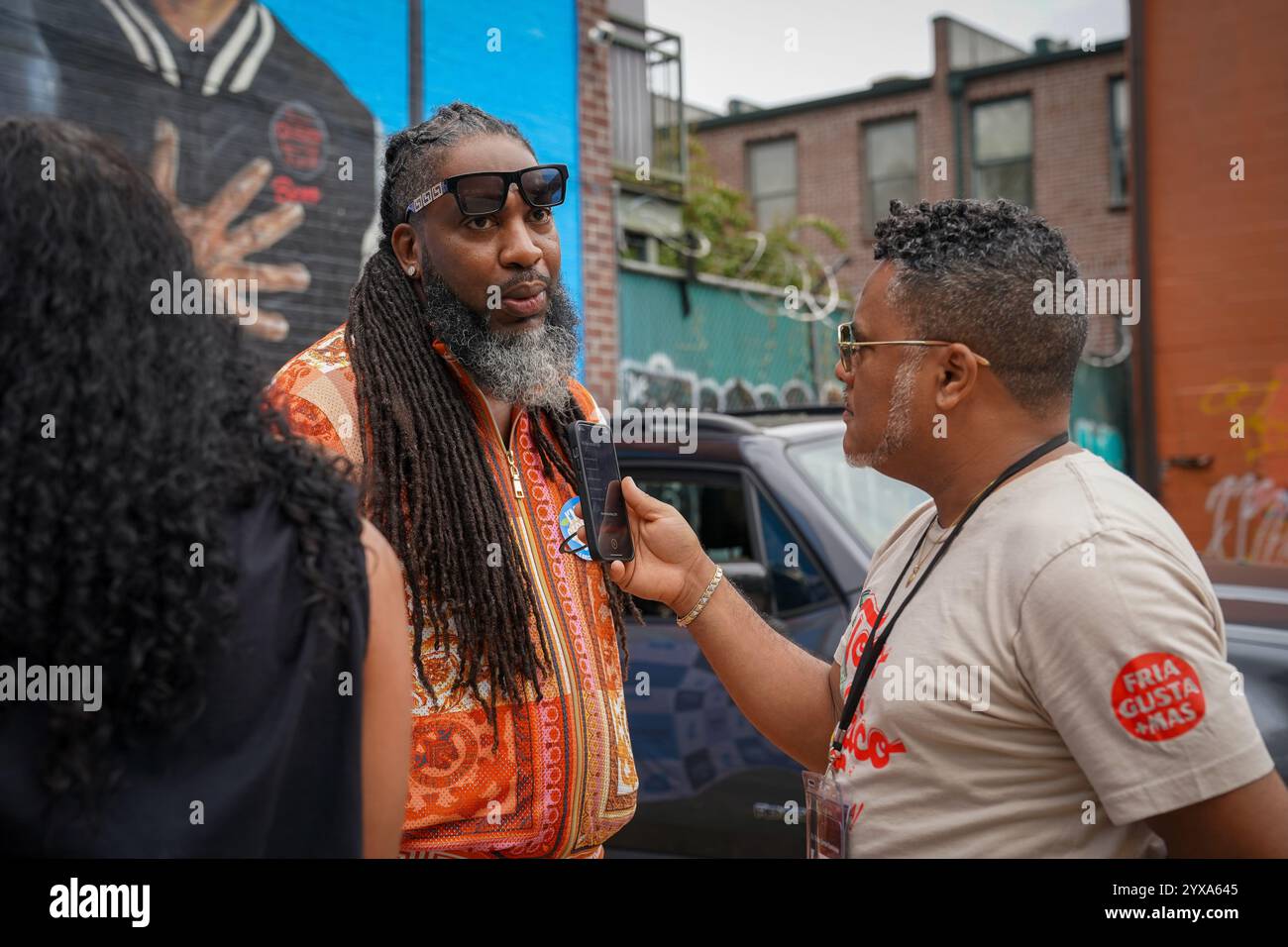 Pastor Troy (Micah Troy) speaks to journalist Mike Jordan of the ...