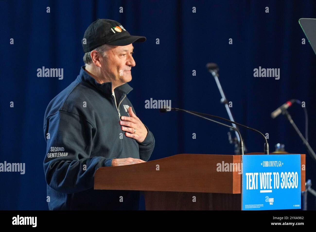 Douglas Emhoff wears a shirt labeled "Second Gentleman" as he speaks at ...