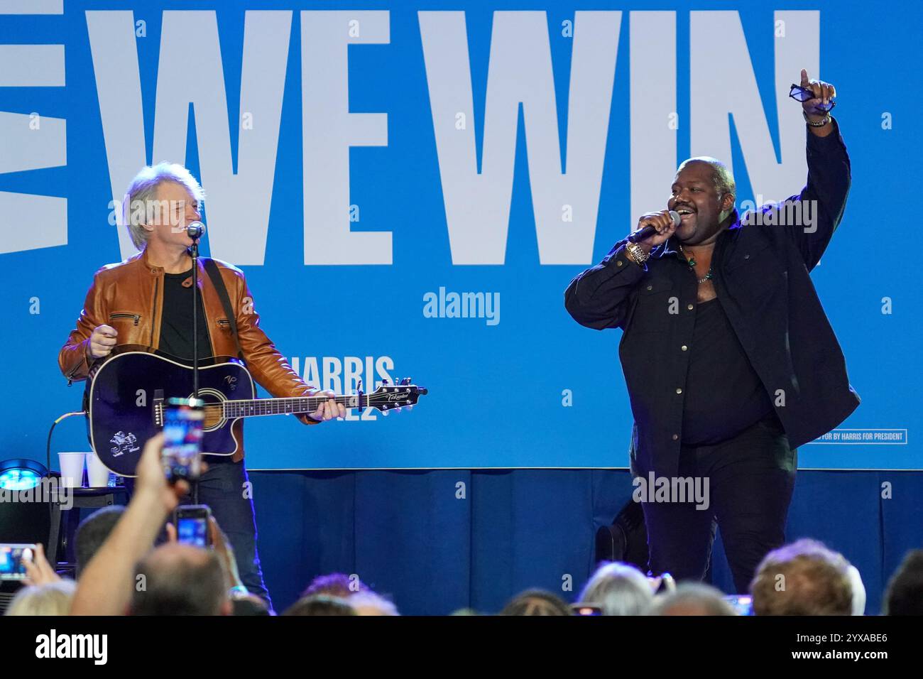 Jon Bon Jovi and Michael Trotter Jr. of The War and Treaty perform onstage during a Team Harris ...