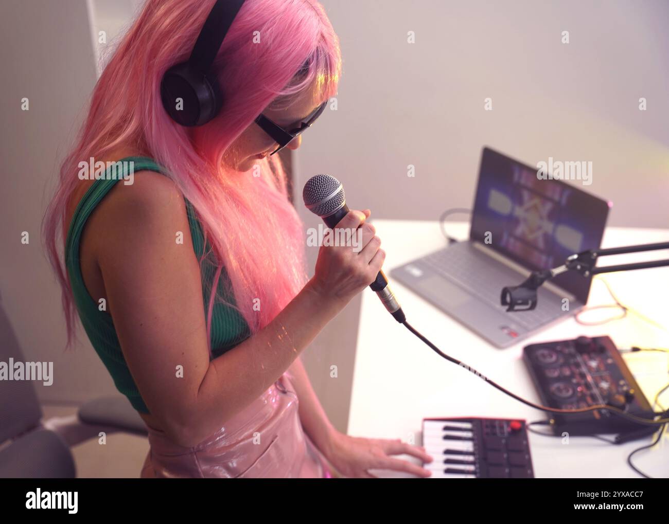 Beautiful young singer and musician broadcast from her home studio ...