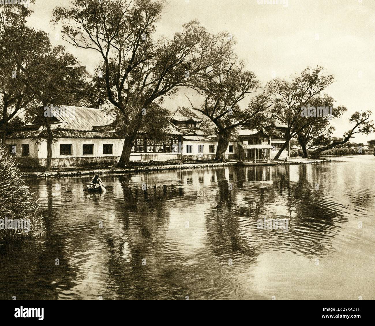 Peaceful waterfront setting with historic buildings and gentle rippling ...