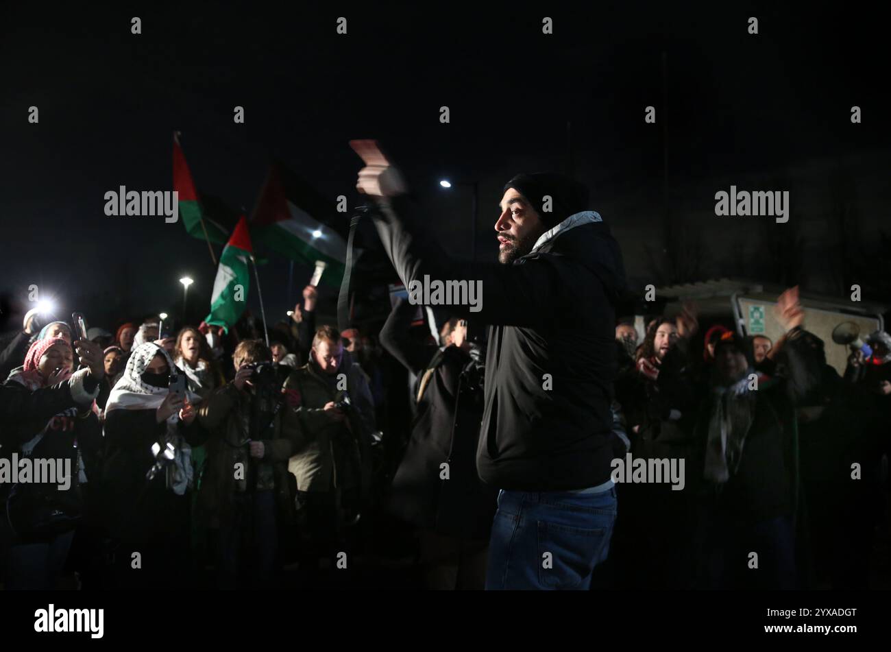 Reigate, England, UK. 14th Dec, 2024. Rapper and activist LOWKEY speaks ...