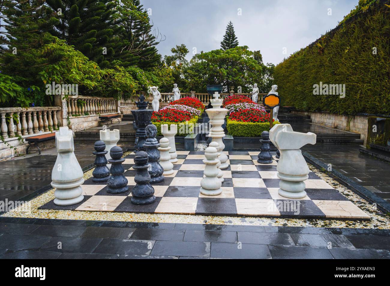 A large chessboard with huge chess pieces on it in the garden at Ba Na ...