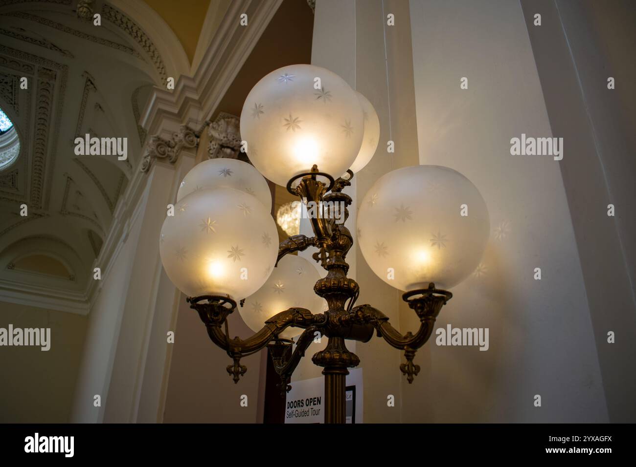A fancy lamp with spherical bulbs at Osgoode Hall, Toronto, adding an ...